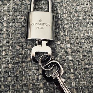 Jewelry | Louis Vuitton Silver Lock | Poshmark